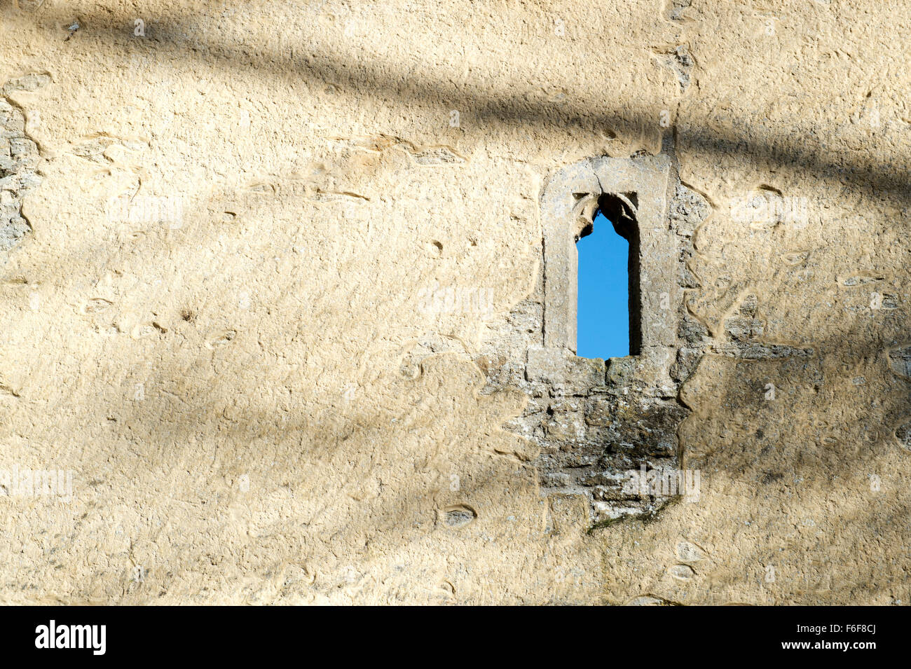 Small arched window in Minster Lovell Hall ruins. Oxfordshire, England ...