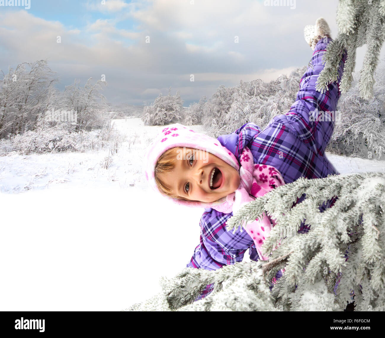 Happy little kid is playing in snow, good winter weather Stock Photo ...