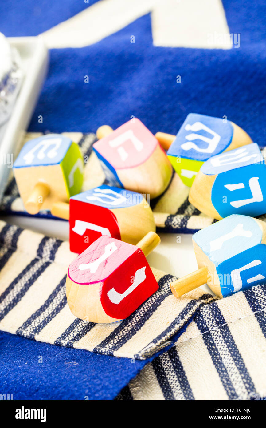 Colorful Hanukkah dreidels on the table Stock Photo - Alamy