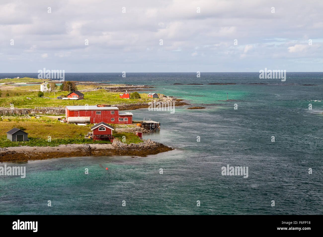 Typical red rorbu fishing hut in town of Svolvaer on Lofoten islands in ...