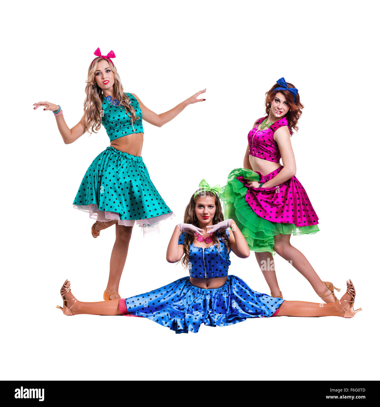 Female disco dancers showing some movements against isolated white ...