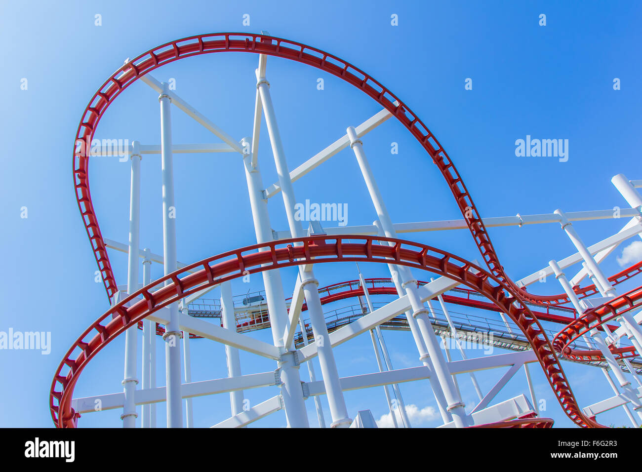 The loops of a scaring roller coaster Stock Photo - Alamy