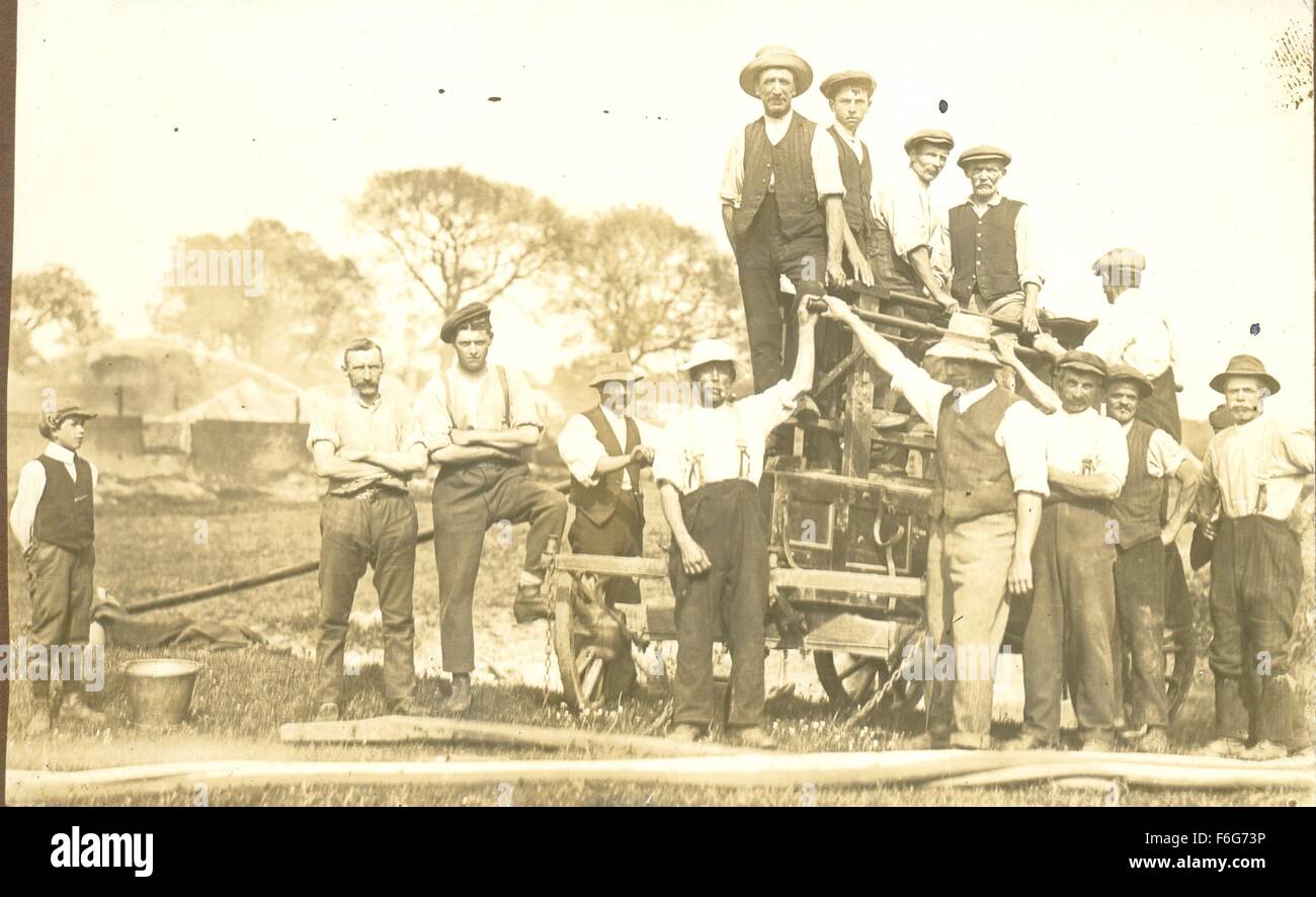 Manual fire engine with volunteer crew Stock Photo - Alamy