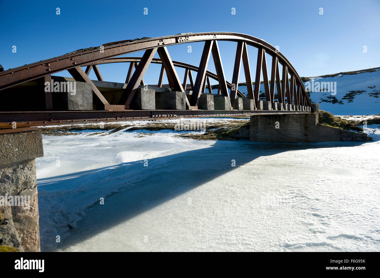 unused railway bridge repurposed to provide a picturesque crossing of ...