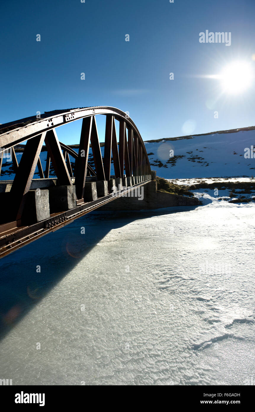 unused railway bridge repurposed to provide a picturesque crossing of ...