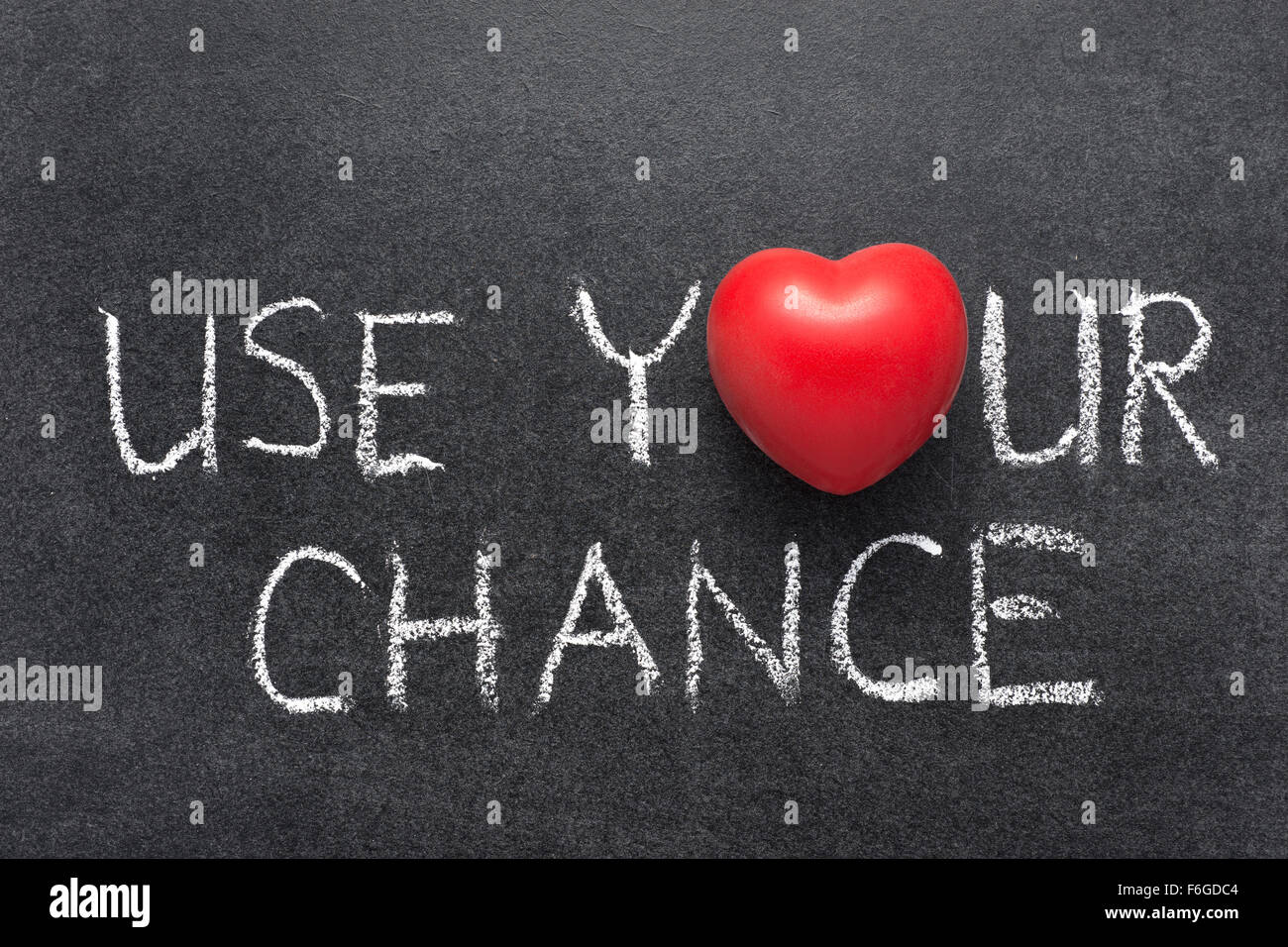 use your chance phrase handwritten on chalkboard with heart symbol ...