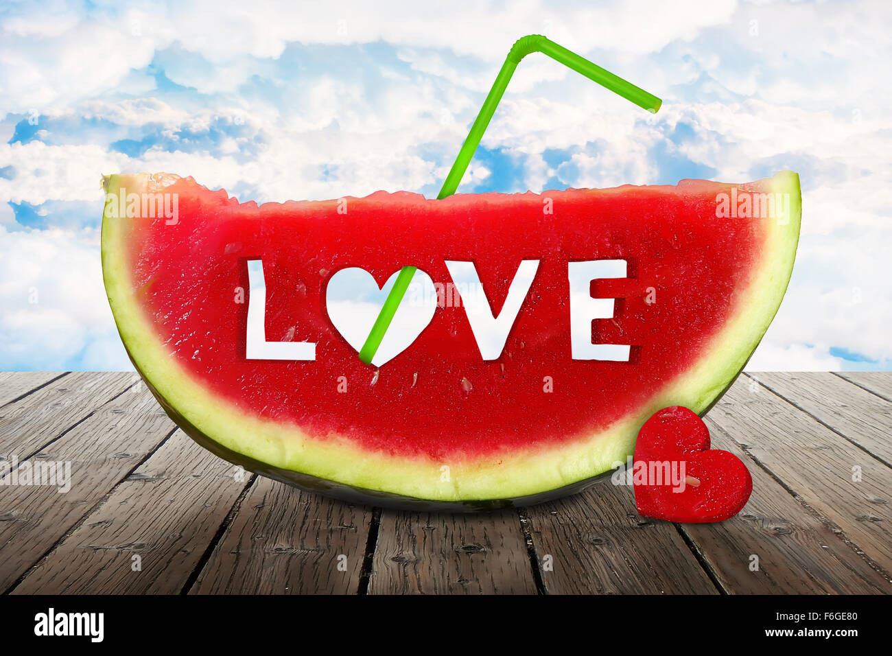 Cut juicy watermelon striped straw hi-res stock photography and images ...