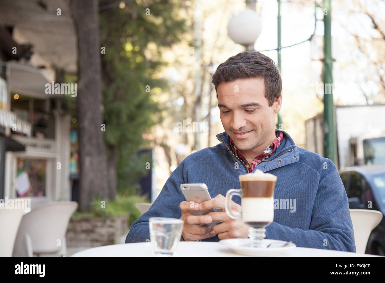 Man sending a message Stock Photo - Alamy