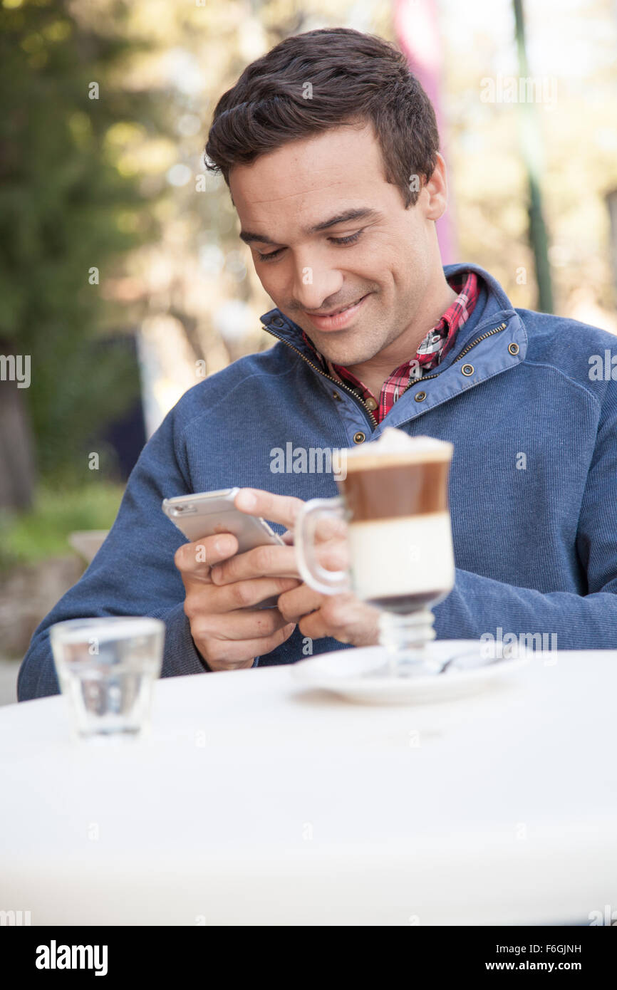 Man sending a message Stock Photo - Alamy