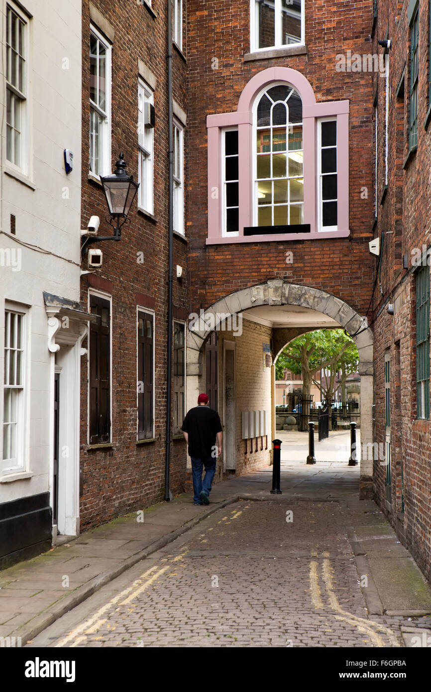 UK, England, Yorkshire, Hull, Prince Street, archway exit to Trinity ...