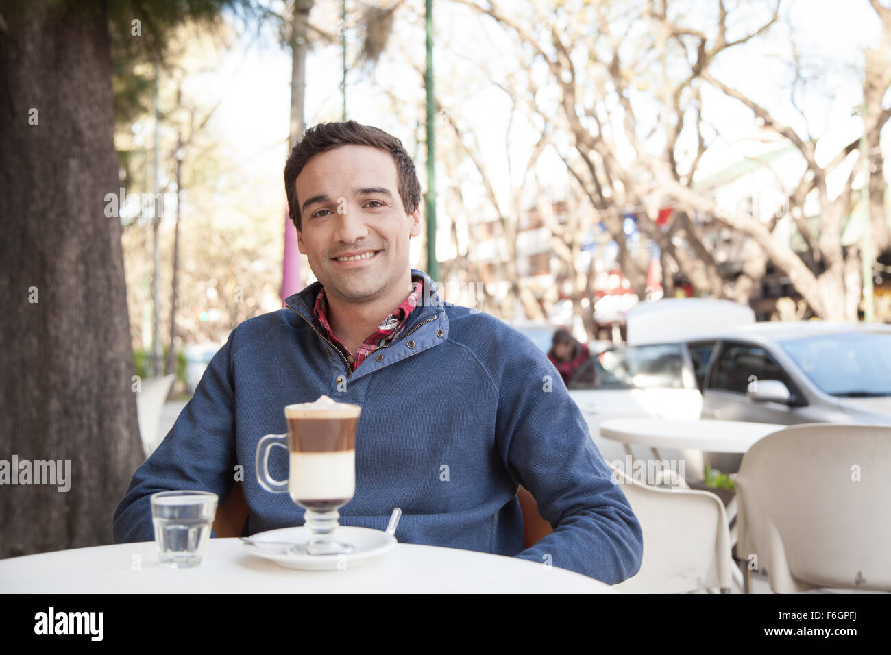 Man looking at camera and smiling Stock Photo - Alamy