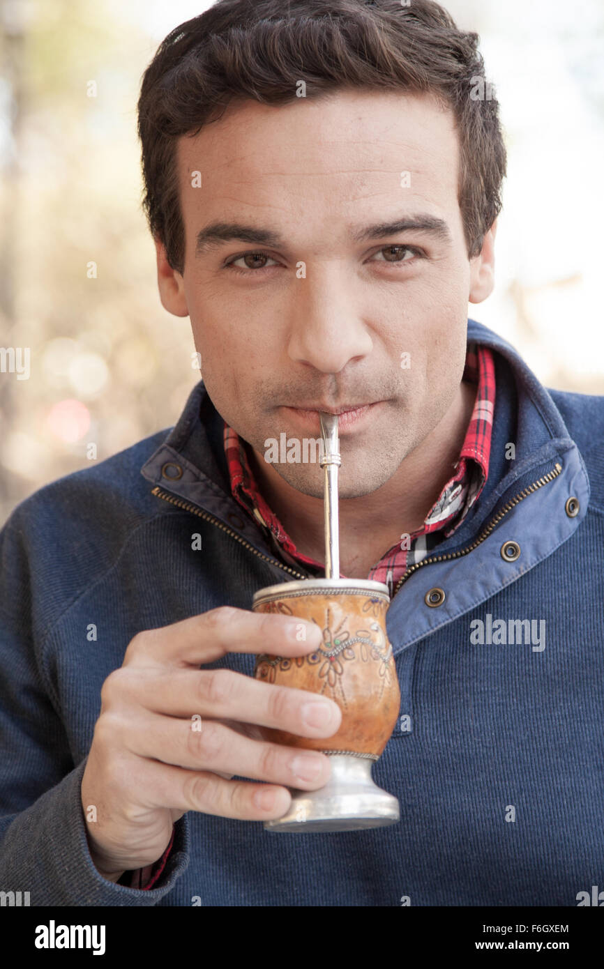 Man drinking mate Stock Photo - Alamy