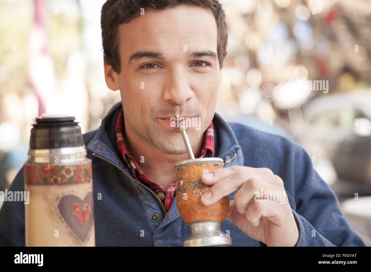 Man drinking mate Stock Photo - Alamy