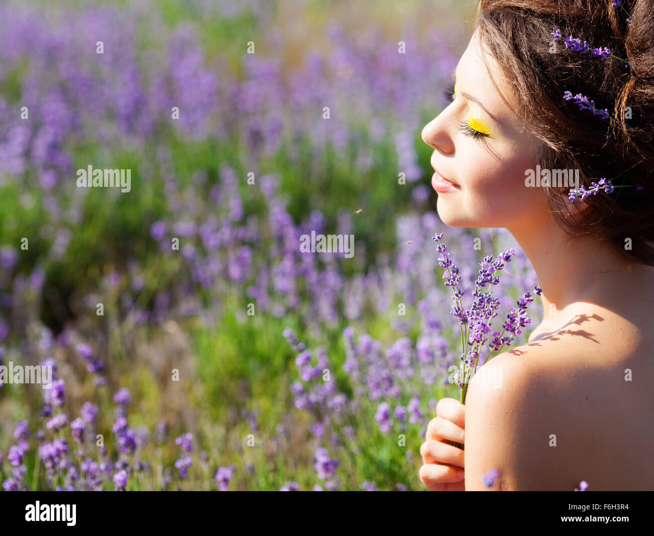 Girl on lavender field Stock Photo - Alamy
