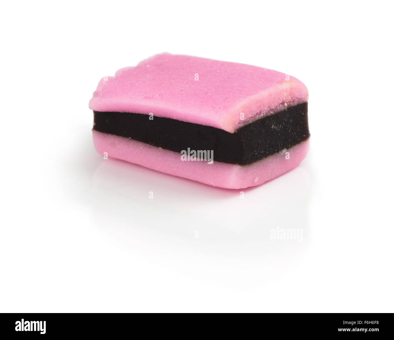 One pink liquorice allsorts candy isolated on white background Stock ...