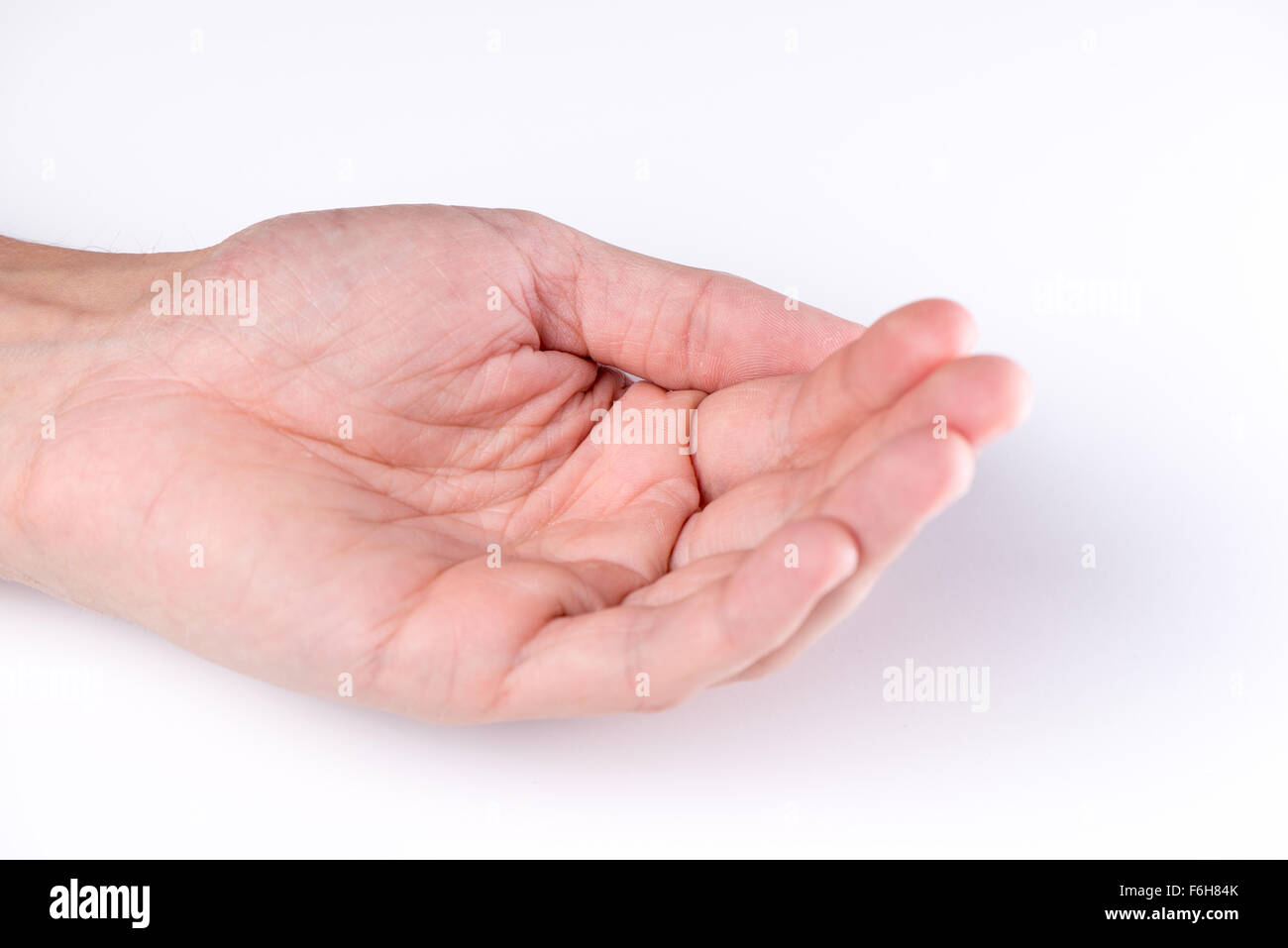An open begging hand for receiving on a white background Stock Photo ...