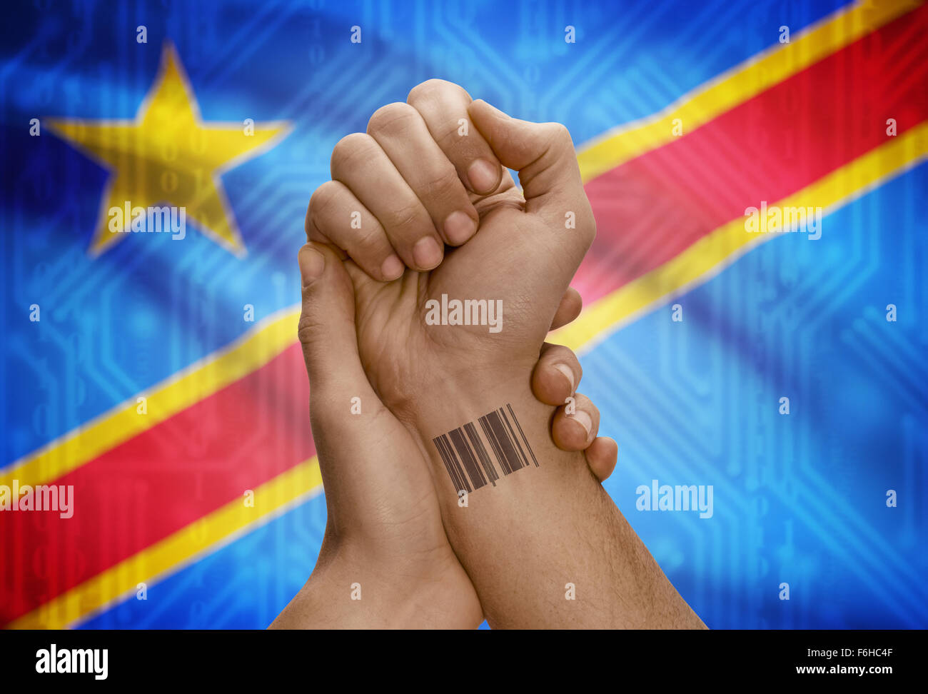 Barcode ID number tattoo on wrist of dark skinned person and national ...