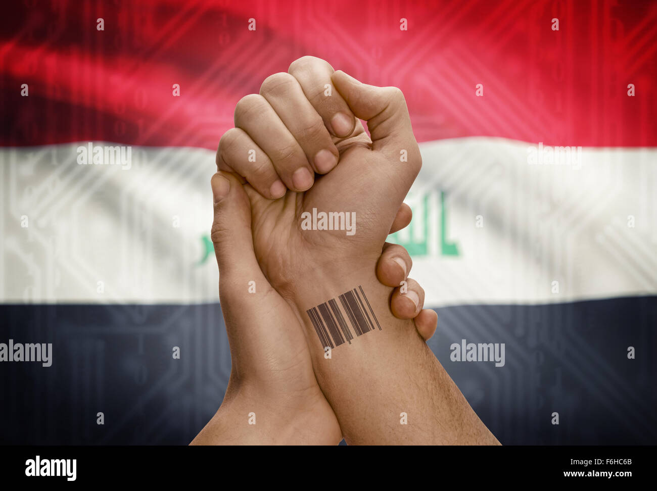 Barcode ID number tattoo on wrist of dark skinned person and national ...