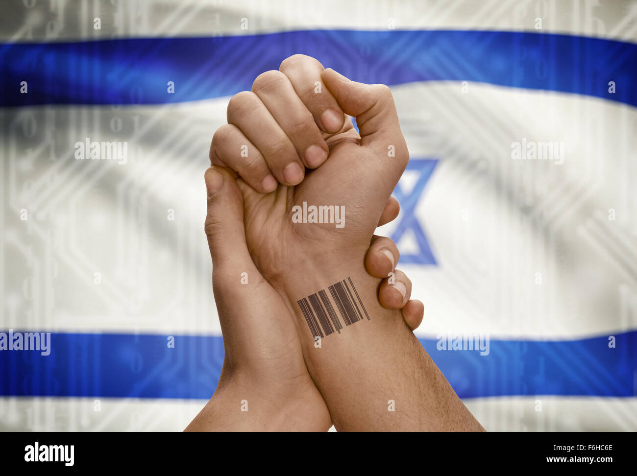 Barcode ID number tattoo on wrist of dark skinned person and national ...