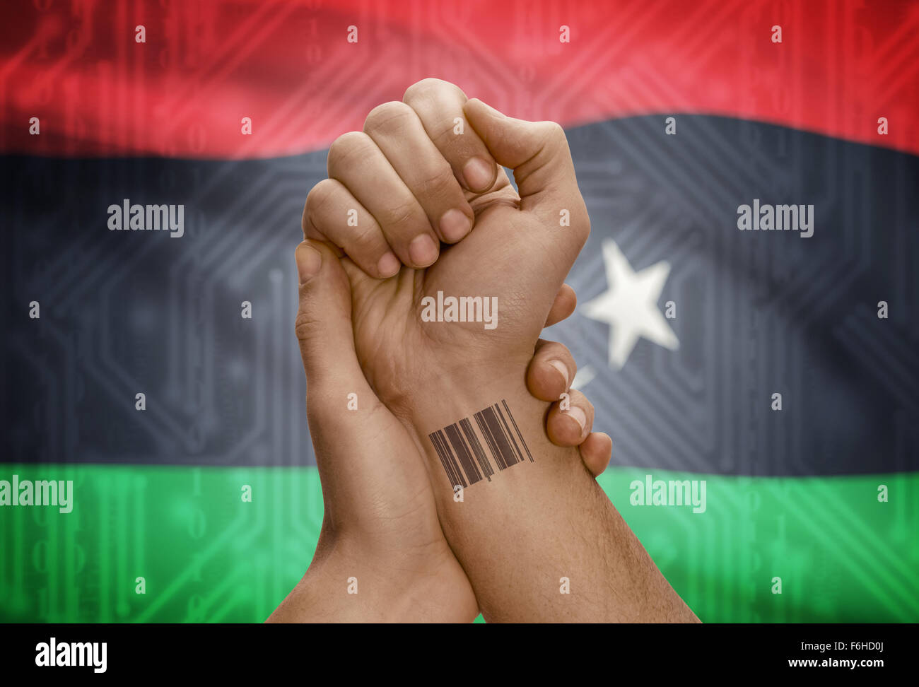 Barcode ID number tattoo on wrist of dark skinned person and national ...