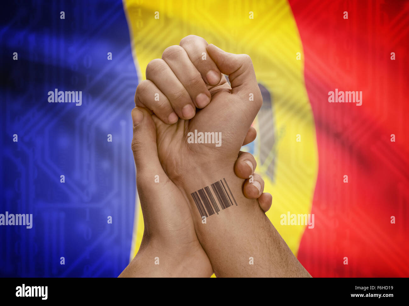 Barcode ID number tattoo on wrist of dark skinned person and national ...