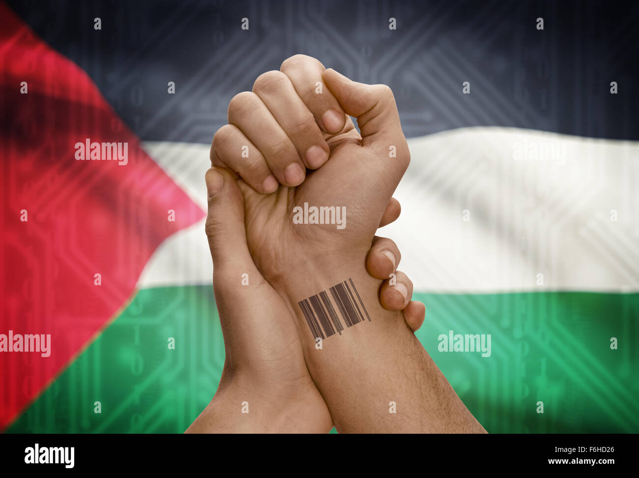 Barcode ID number tattoo on wrist of dark skinned person and national ...