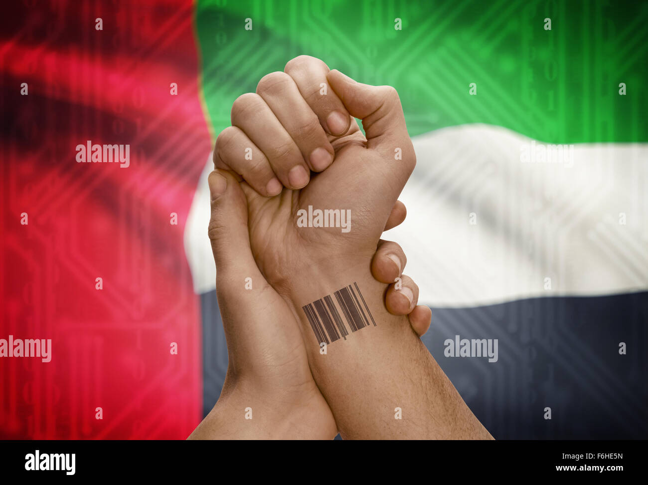 Barcode ID number tattoo on wrist of dark skinned person and national ...