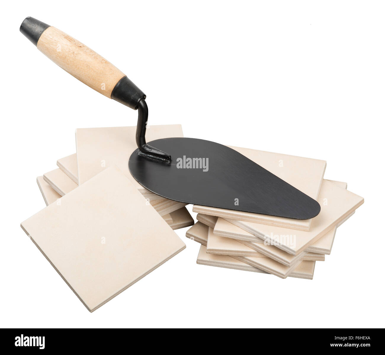 Pile of tiles with float on black Stock Photo - Alamy