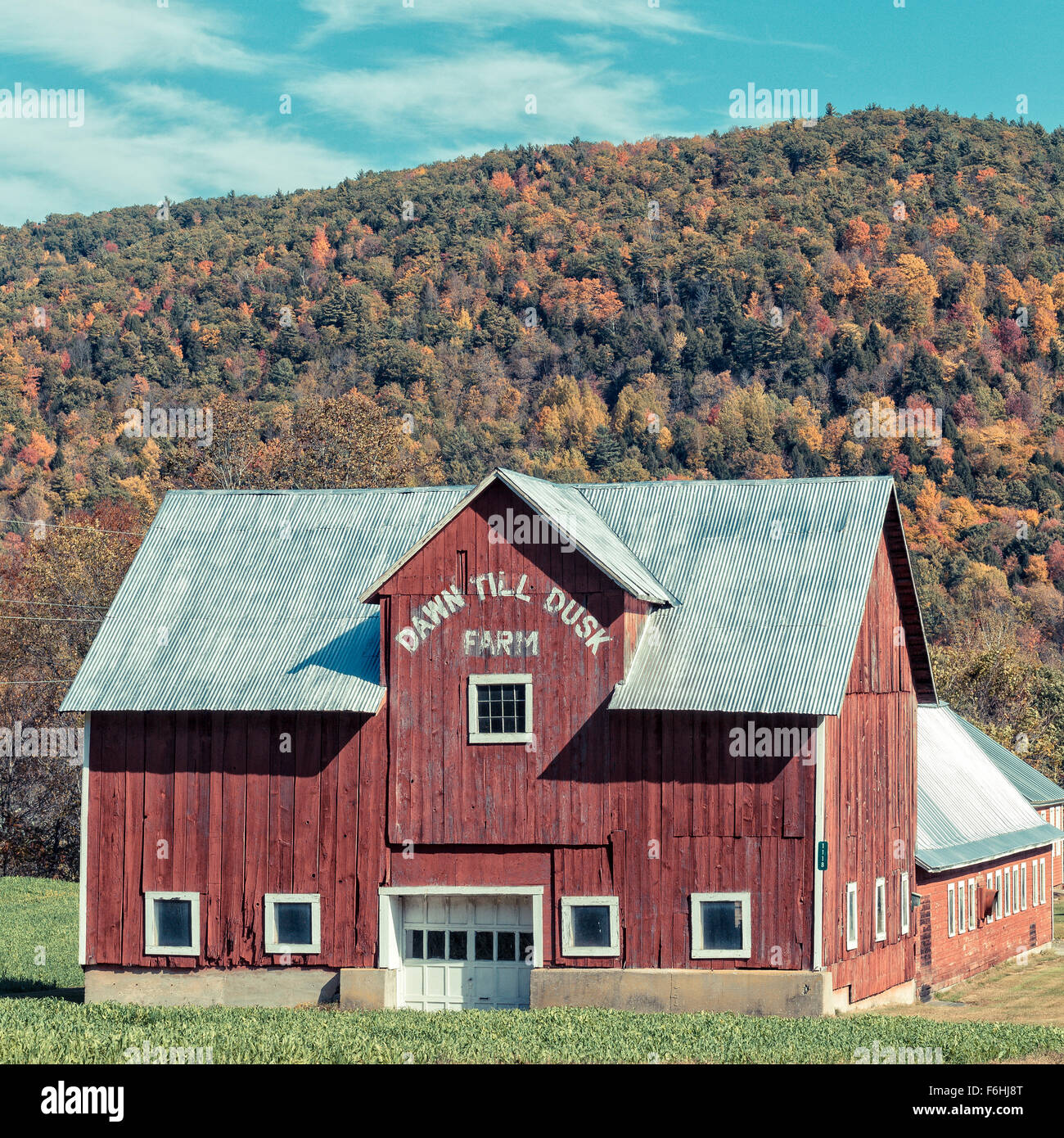 Old red barn in Vermont with the words Dawn Till Dusk Farm painted on ...
