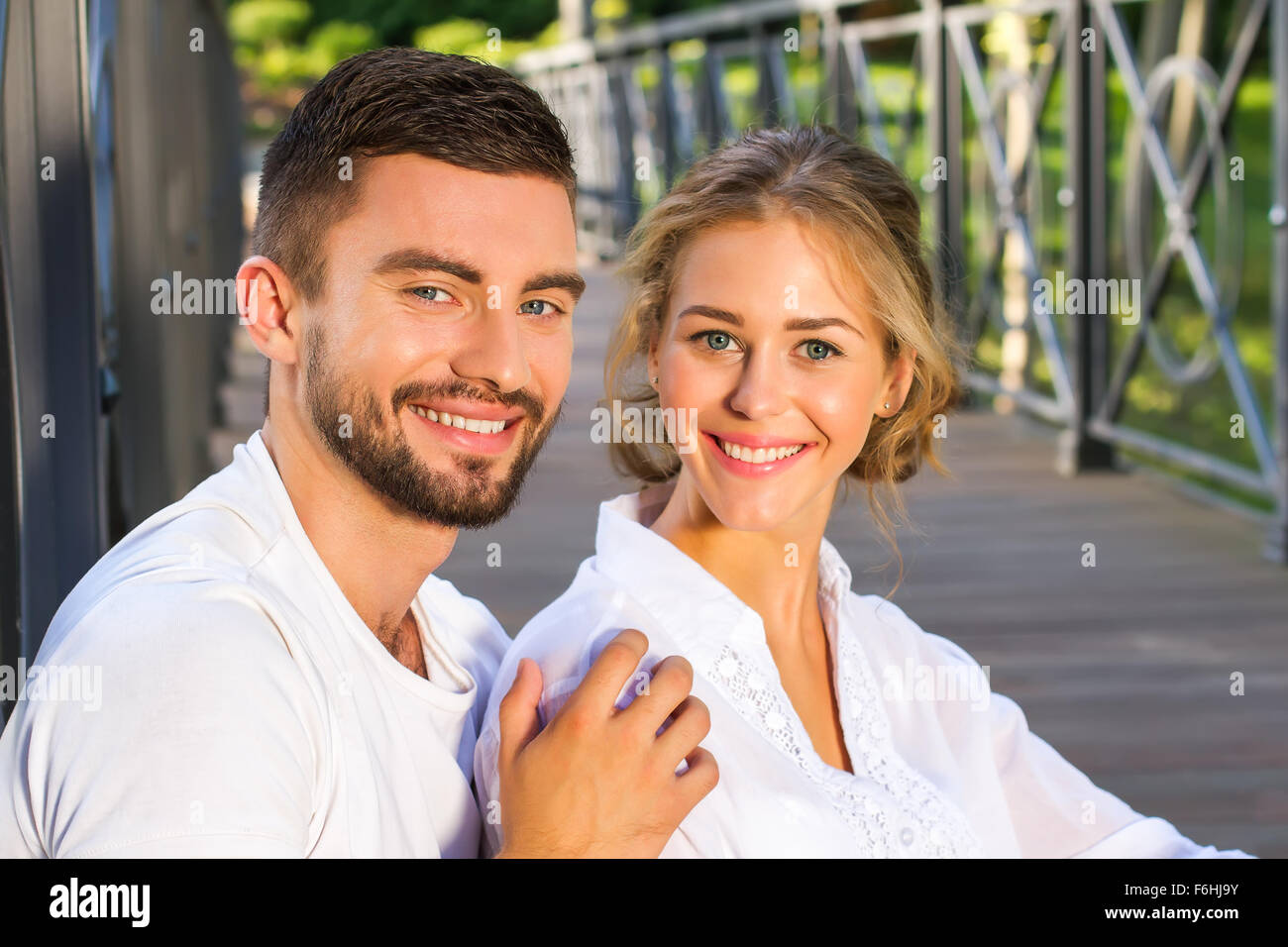 Close-up of a couple smiling Stock Photo - Alamy