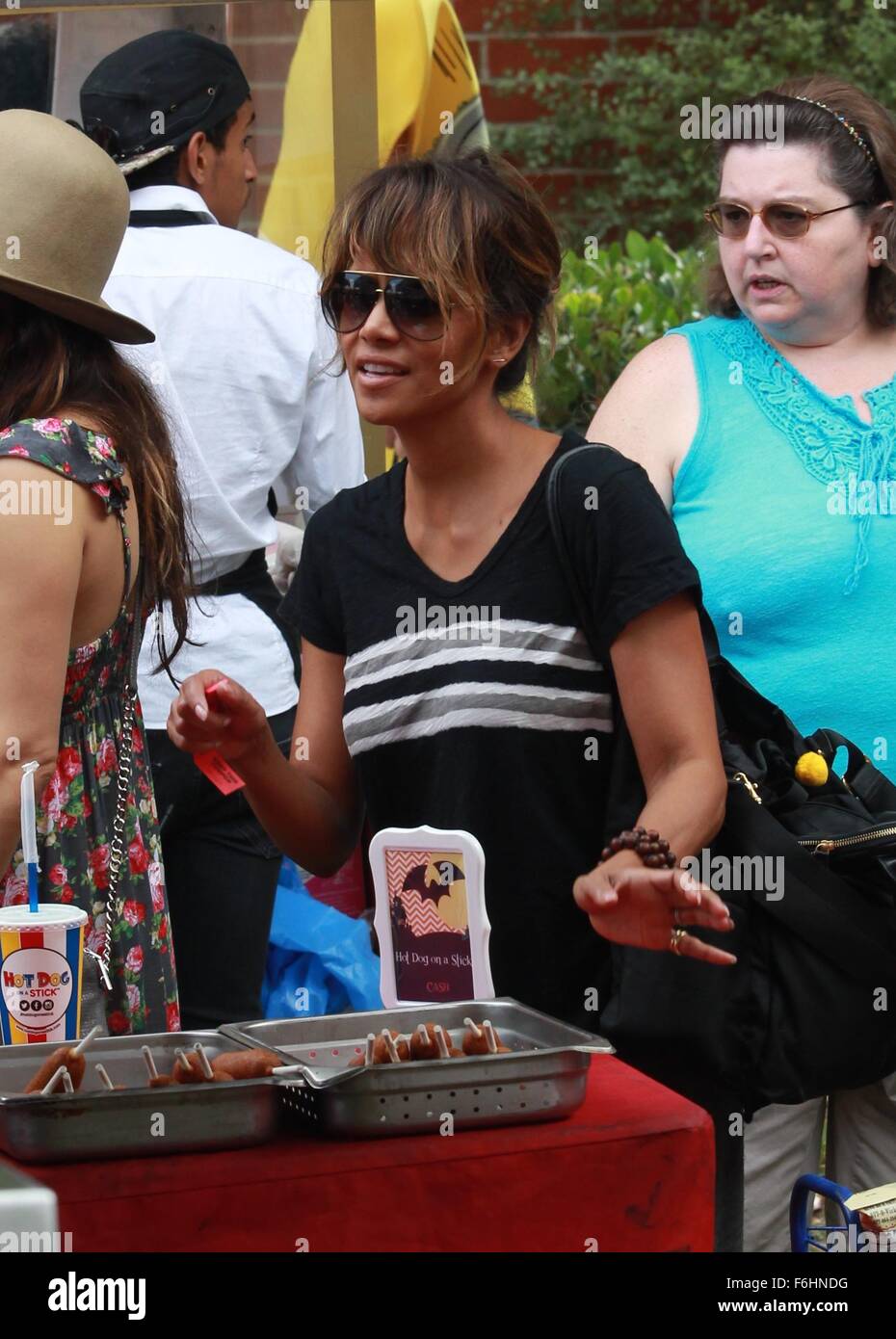 Halle Berry attends a Halloween festival with her husband and son ...