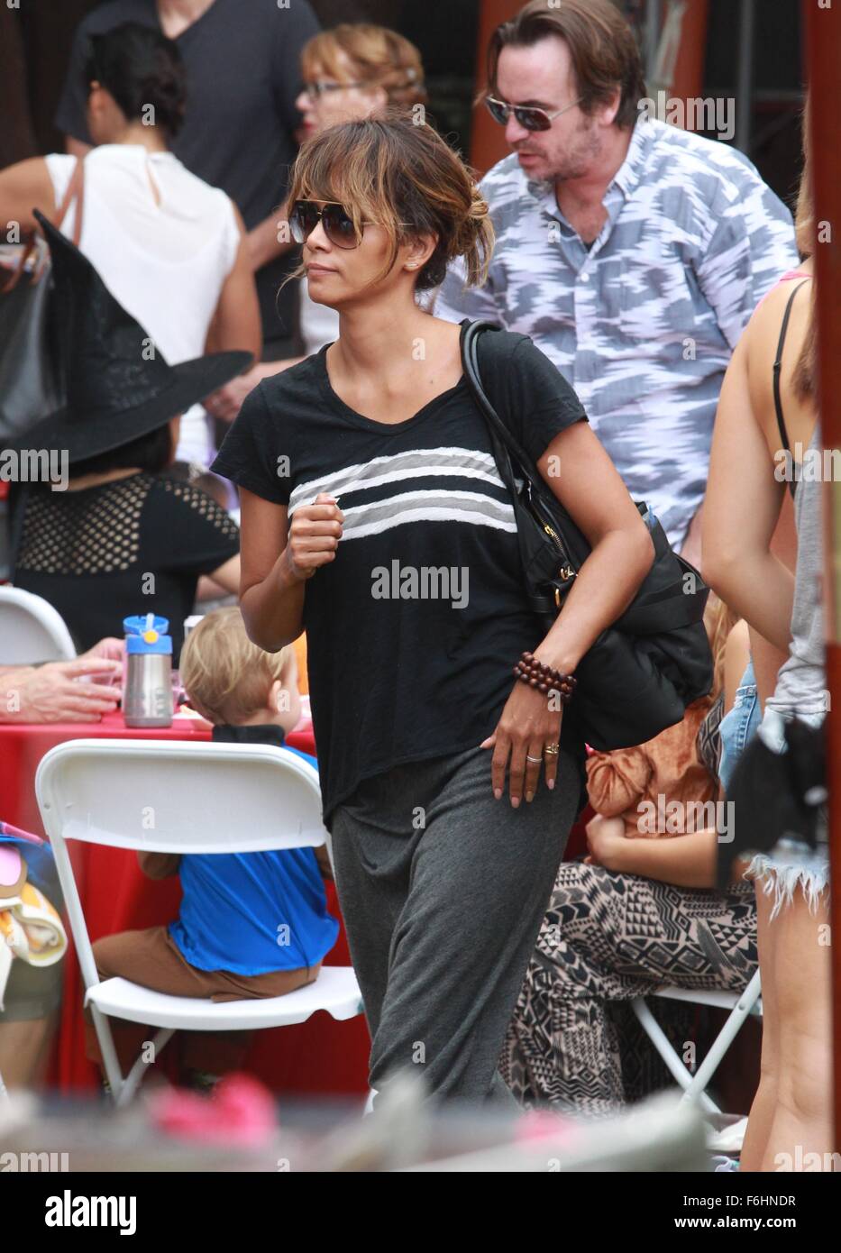 Halle Berry attends a Halloween festival with her husband and son ...