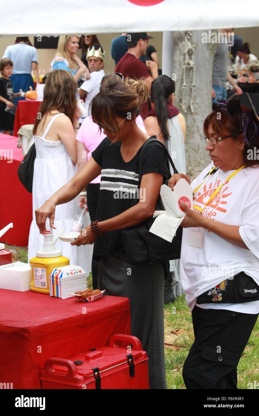 Halle Berry attends a Halloween festival with her husband and son ...