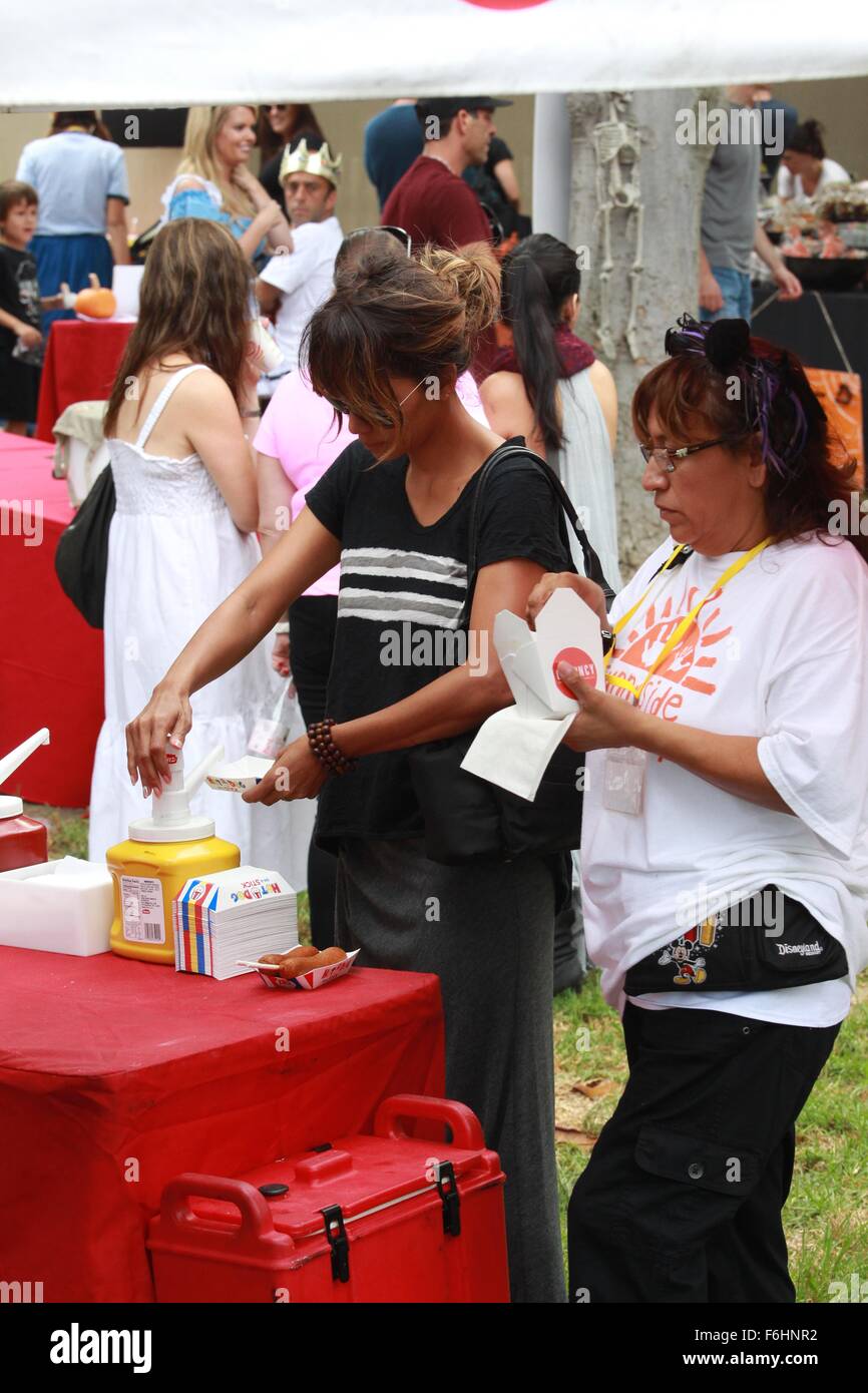 Halle Berry attends a Halloween festival with her husband and son ...