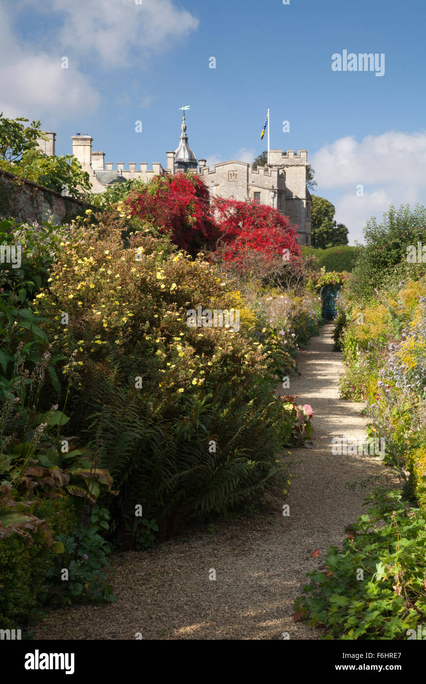 Colourful floral borders in autumn looking back towards the house ...