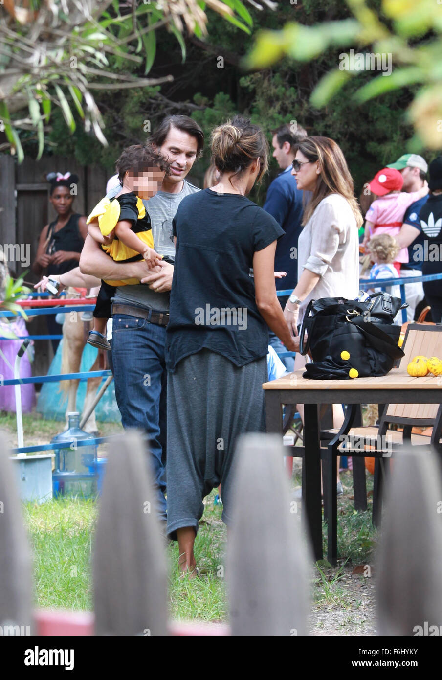 Halle Berry, Oliver Martinez, and their son Maceo attend a Halloween ...