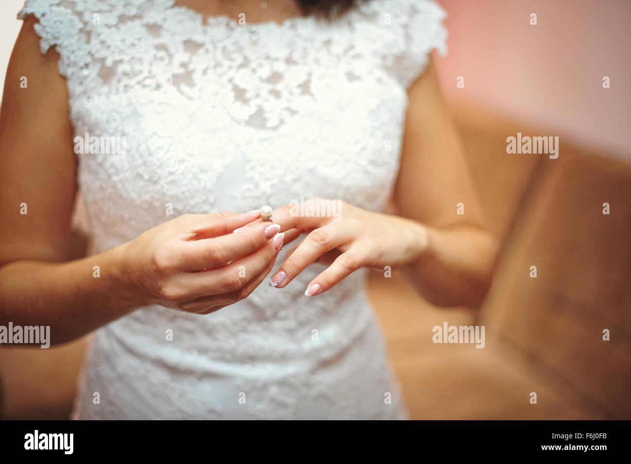 Hands of bride with ring Stock Photo - Alamy