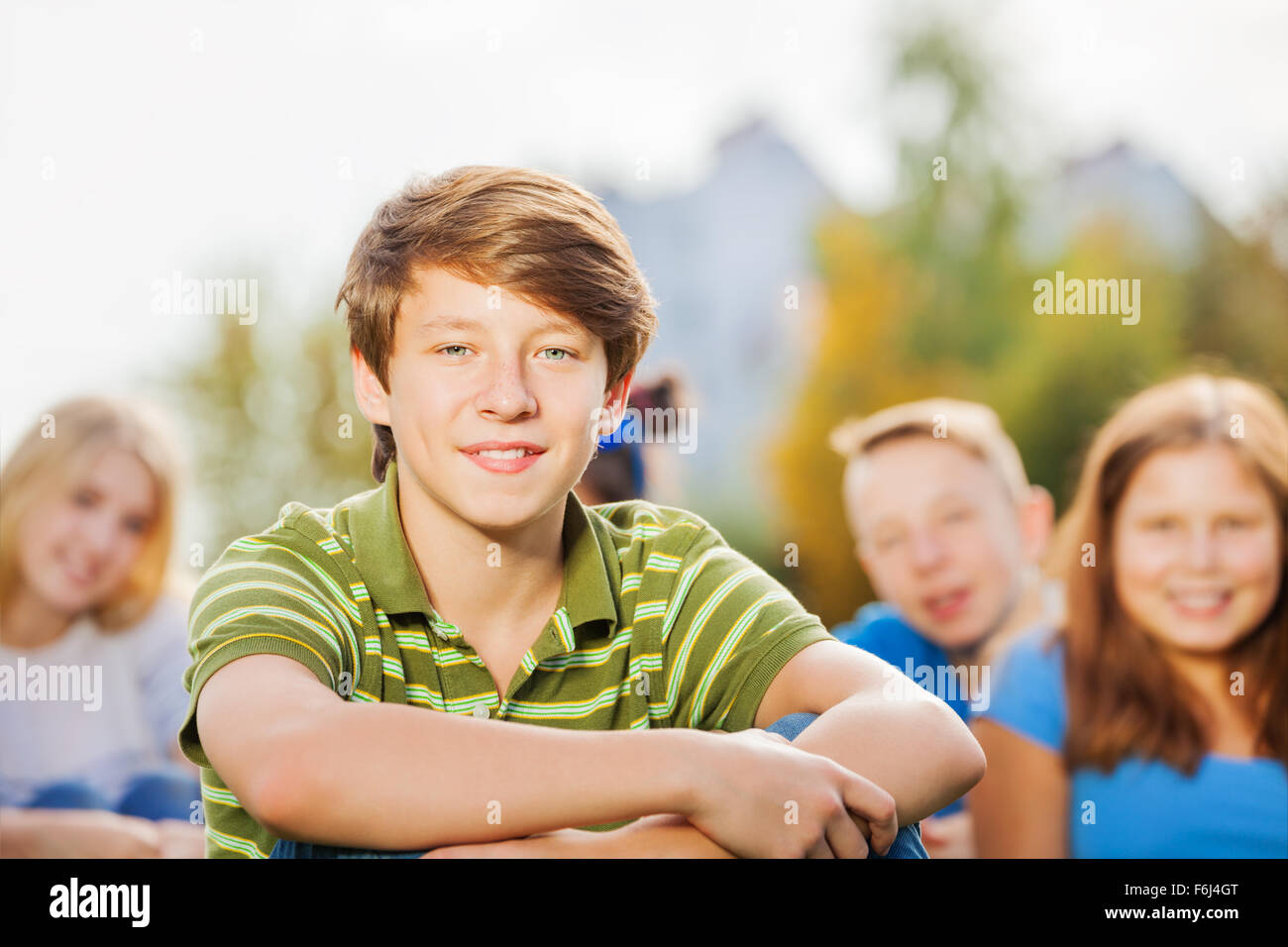 Portrait of boy, friends on background together Stock Photo - Alamy