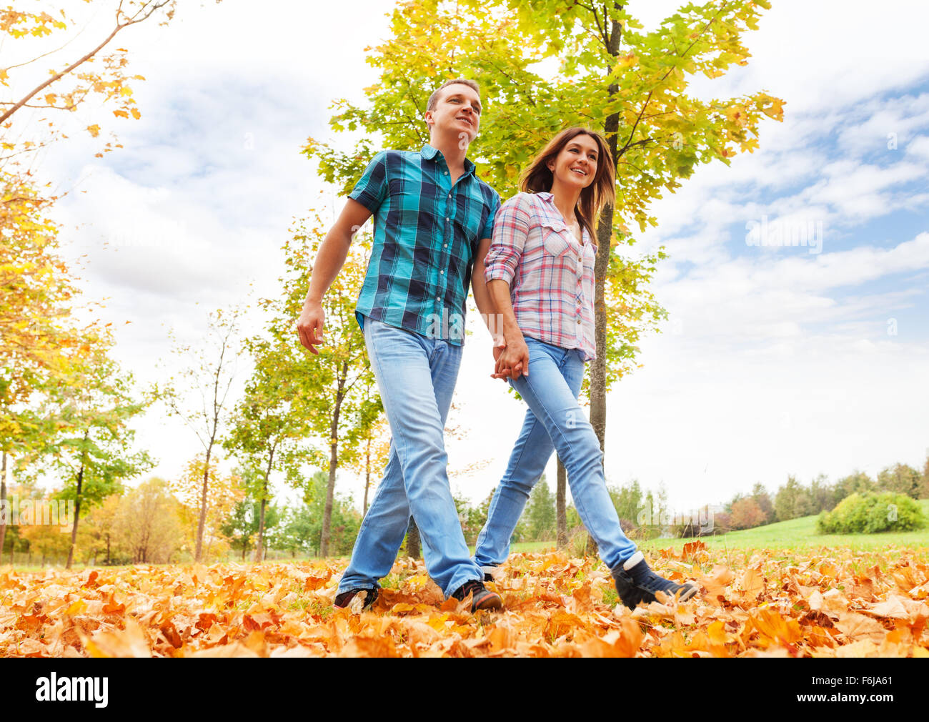Adult couple walk in the park Stock Photo - Alamy