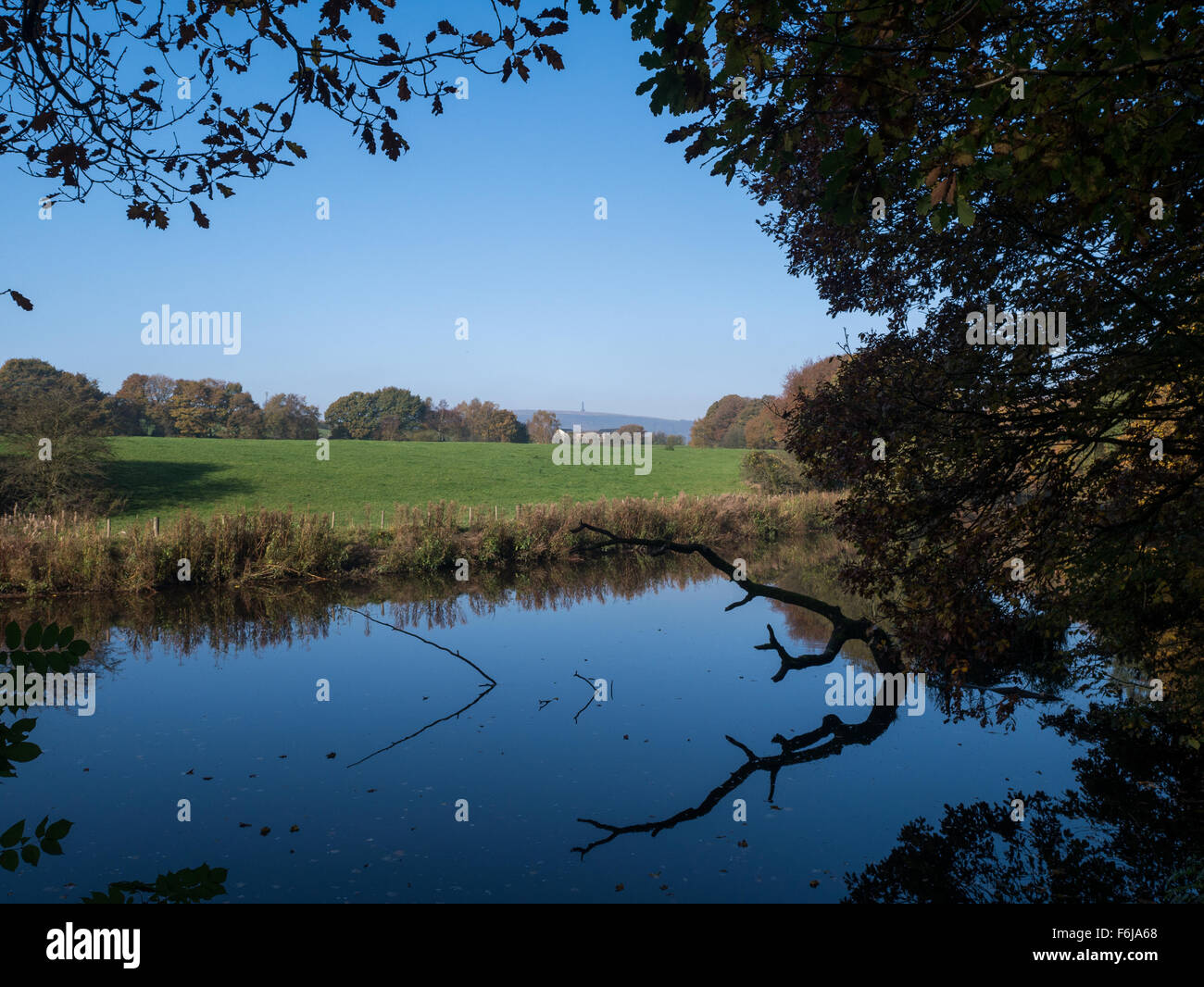 River Irwell at Bury with Peel Tower in background Stock Photo - Alamy