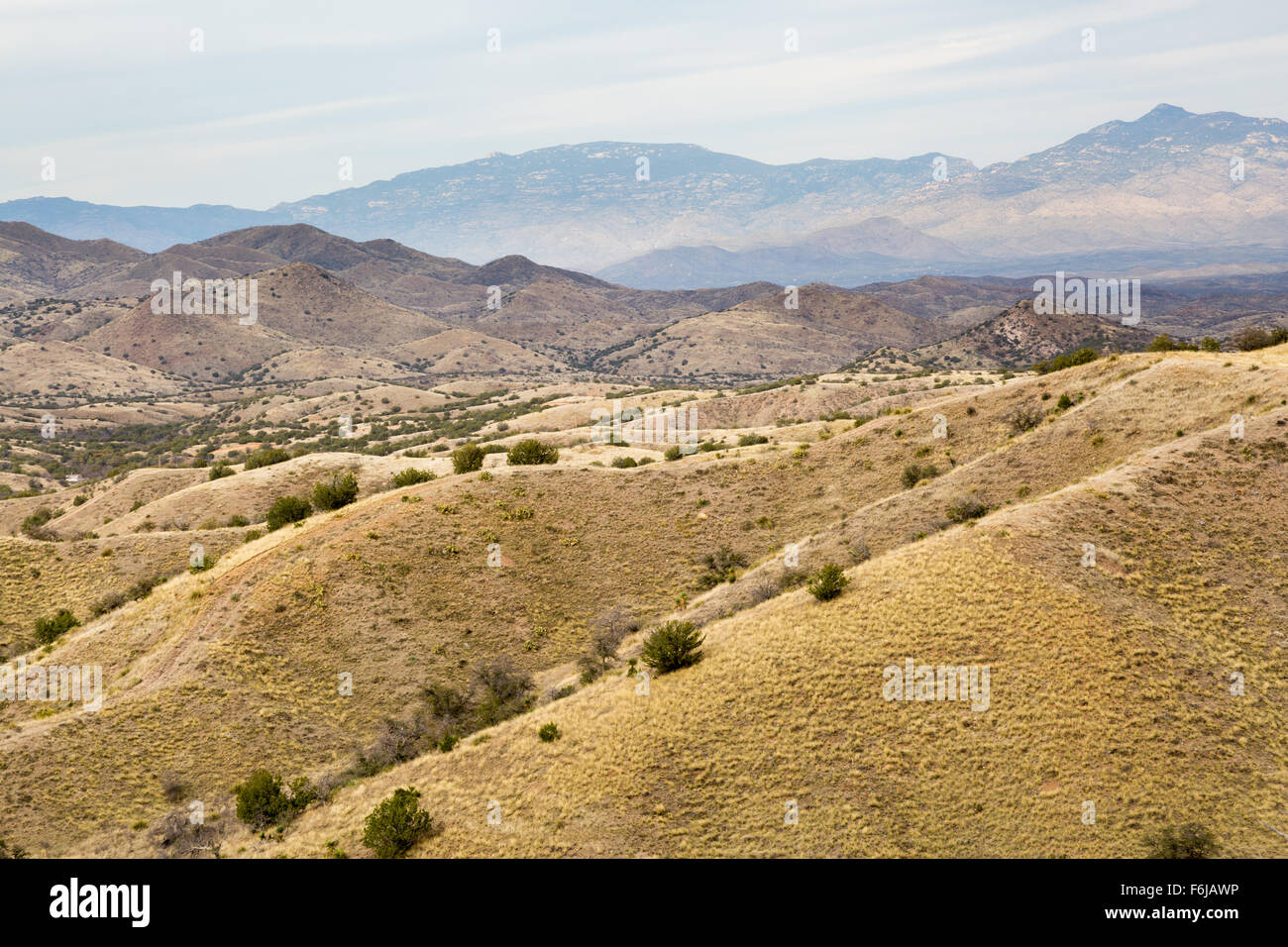 The Rincon Mountains beyond the Santa Rita Mountains grassland hills ...