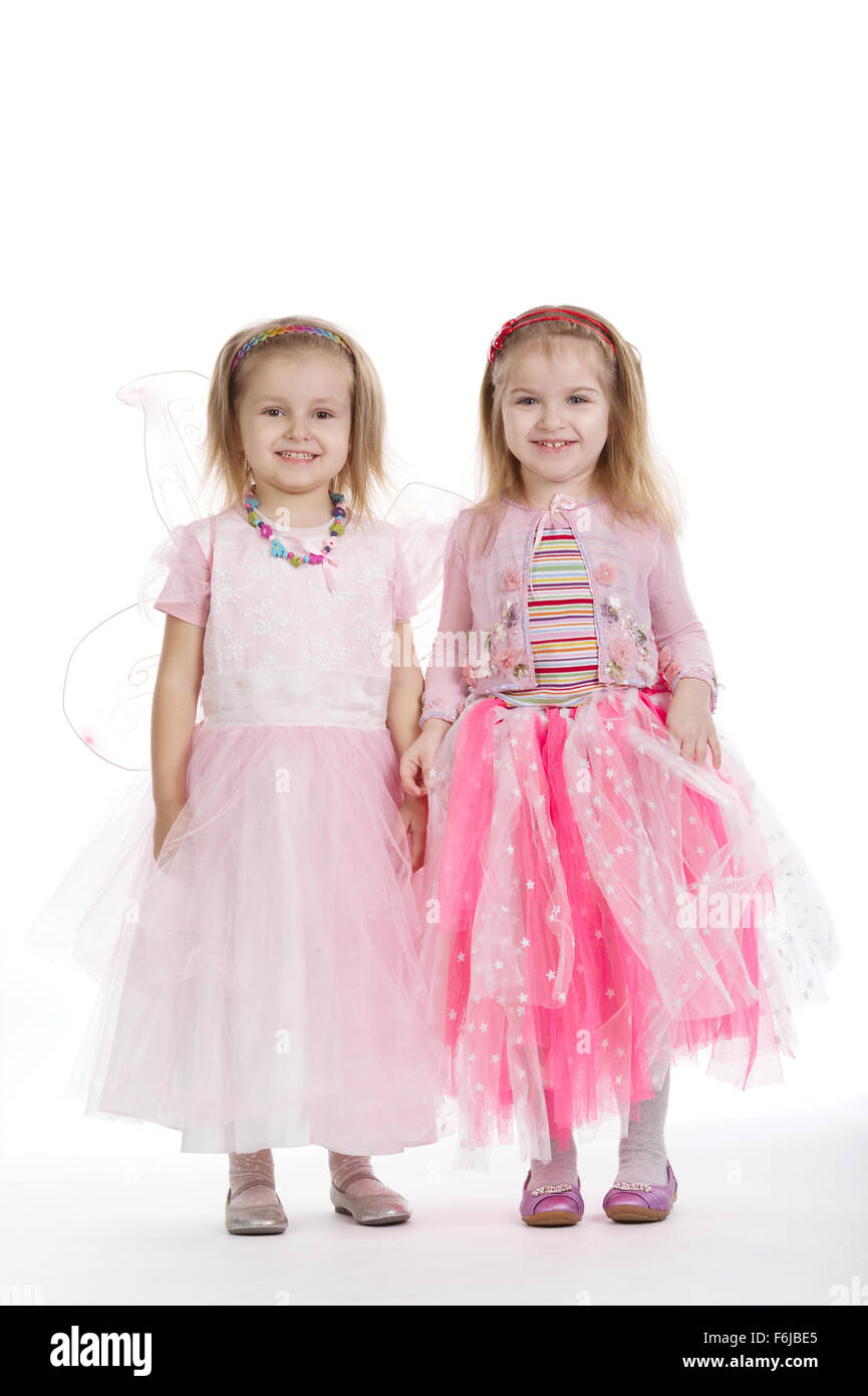 Two little girls - best friends on white Stock Photo - Alamy