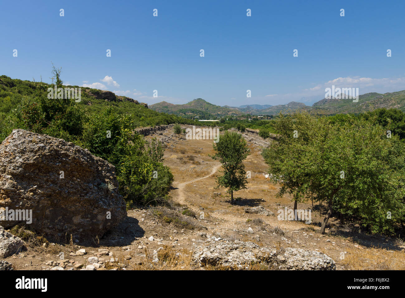 The surroundings of the ancient city of Aspendos. Turkey Stock Photo ...