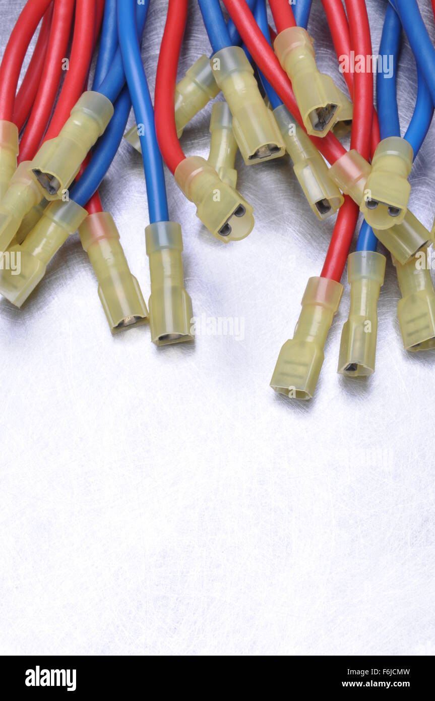 Cables with terminals used in electrical installation systems on grey ...