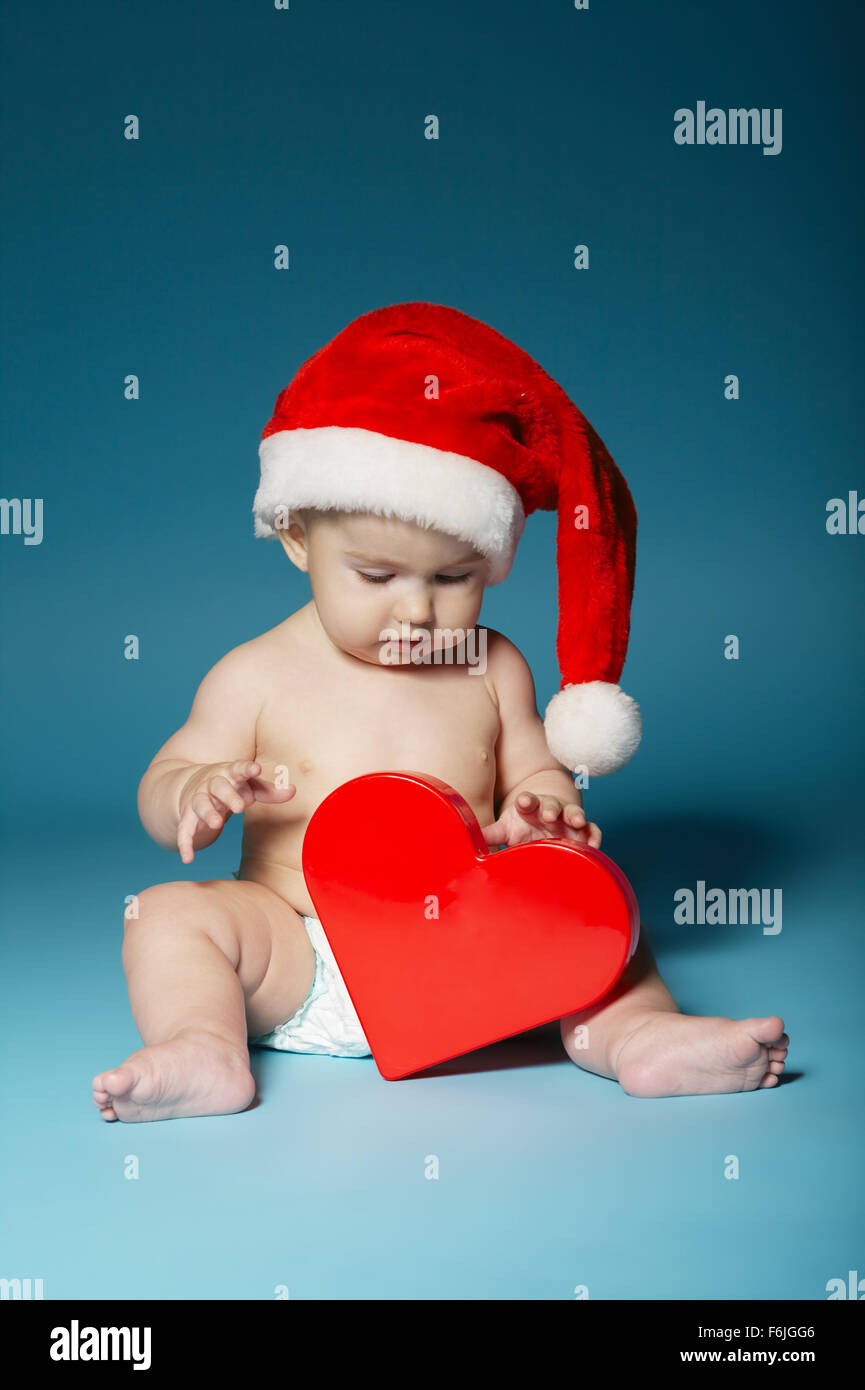 boy in diapers with hat of Santa Claus Stock Photo - Alamy