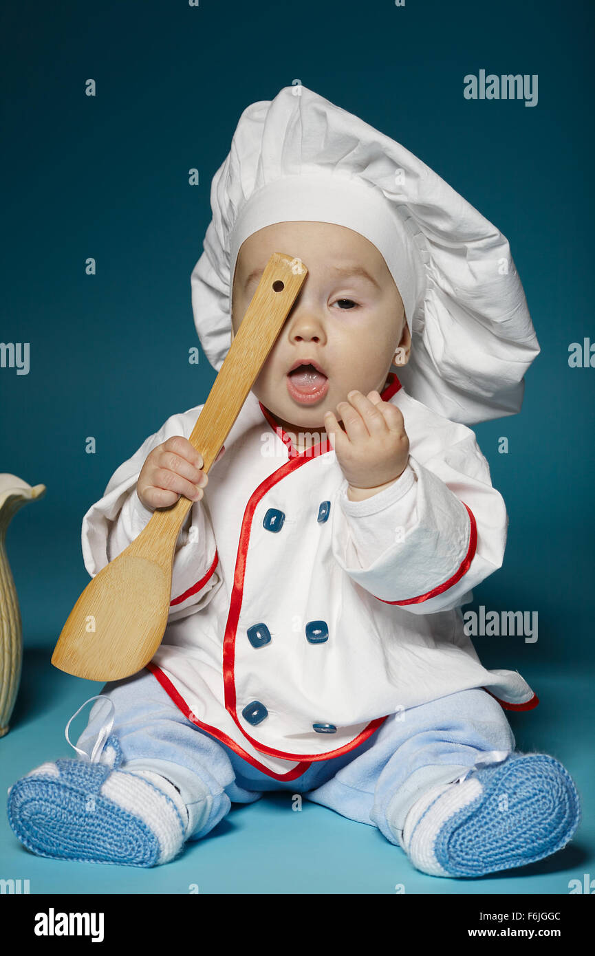 cute little baby with chef hat Stock Photo - Alamy