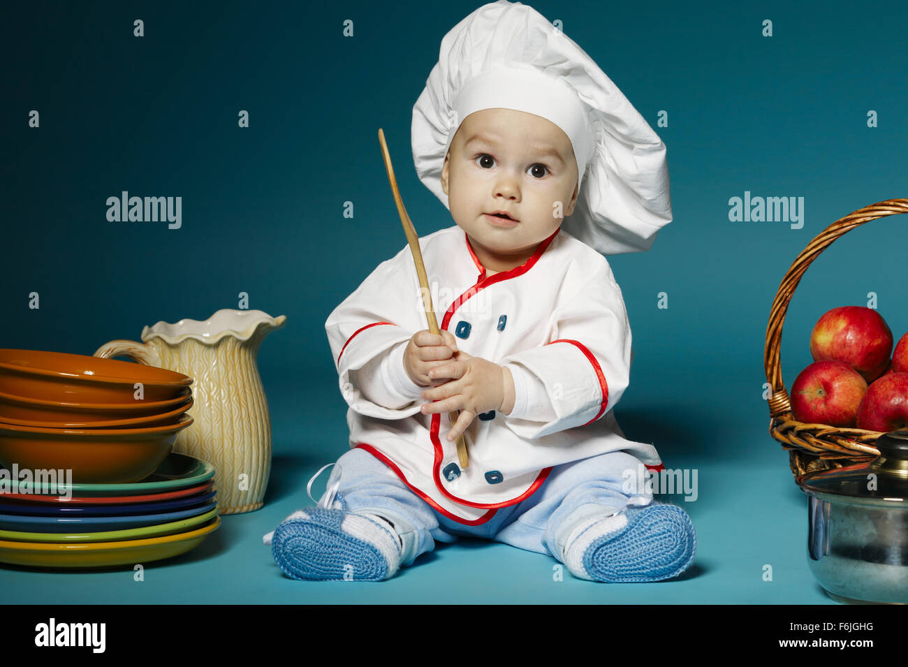 cute little baby with chef hat Stock Photo - Alamy