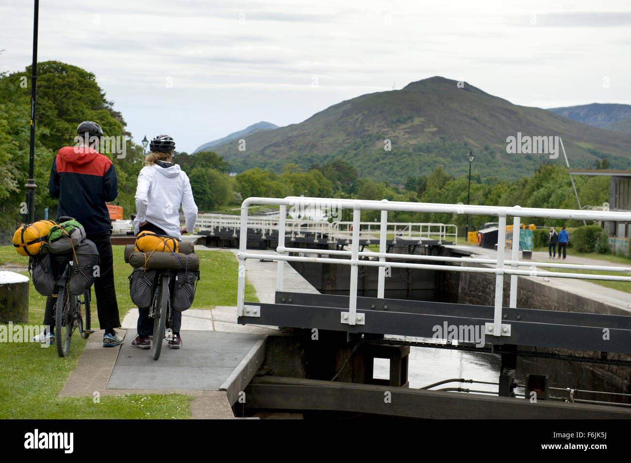 Cyclists admire part of Neptunes staircase. A series of eight lock ...