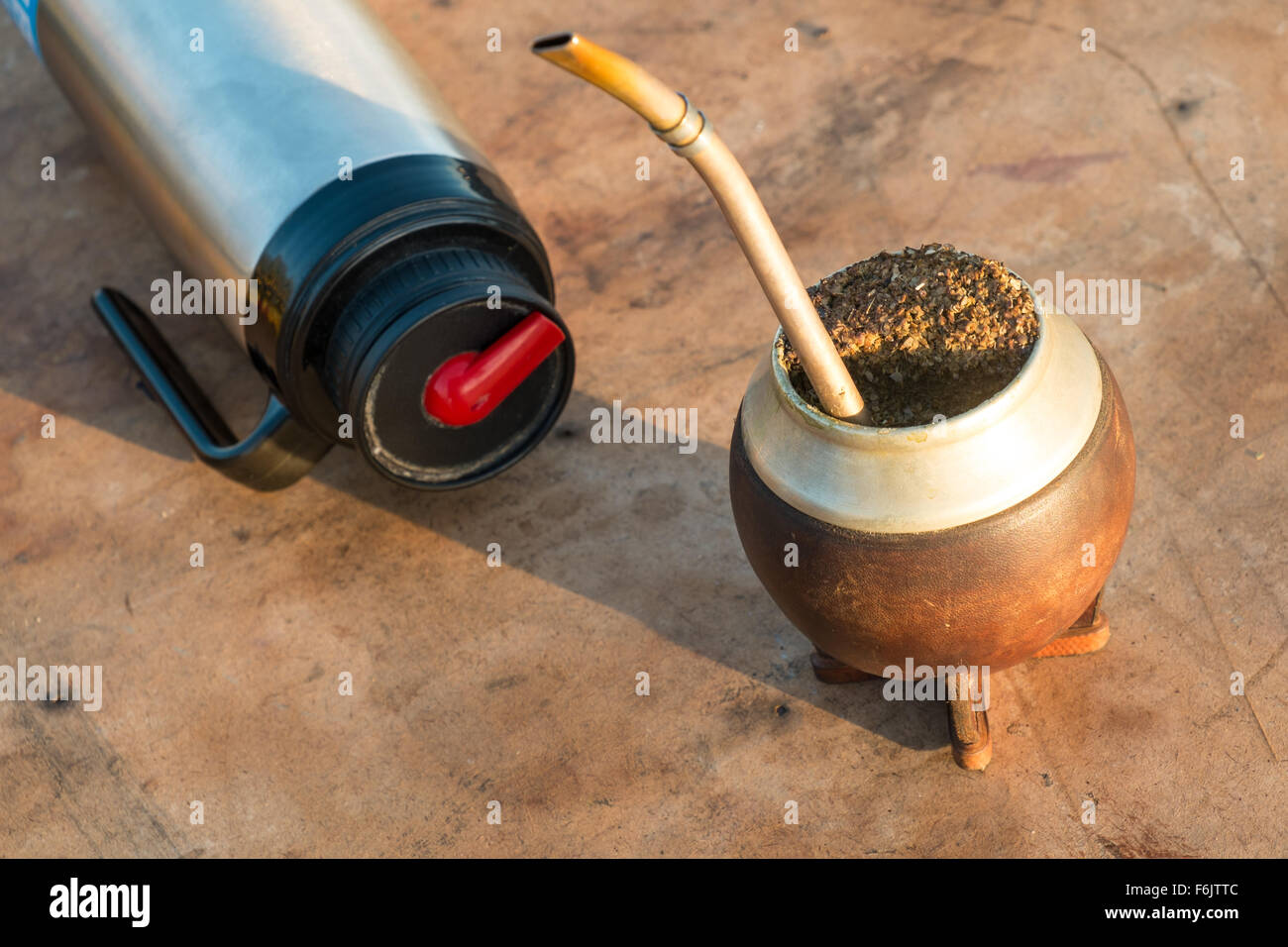 Traditional mate drinking equipment on a rustic table Stock Photo - Alamy
