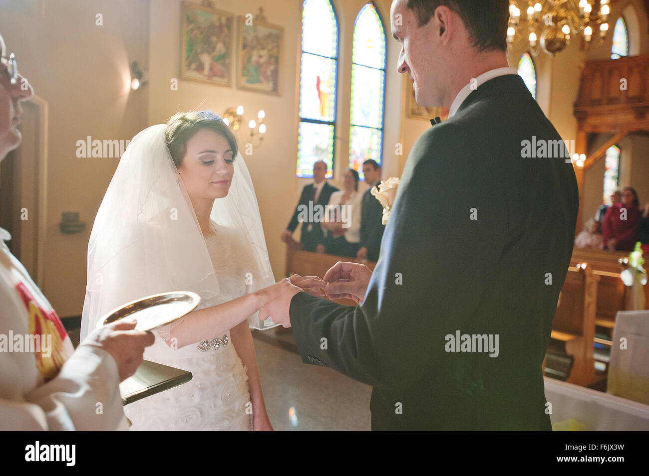 christian wedding couple at catholic church Stock Photo - Alamy